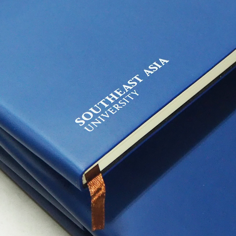 ผลงานสมุดโน้ต สกรีนโลโก้ SOUTHEAST ASIA UNIVERSITY | โรงงานผลิตปากกา ...